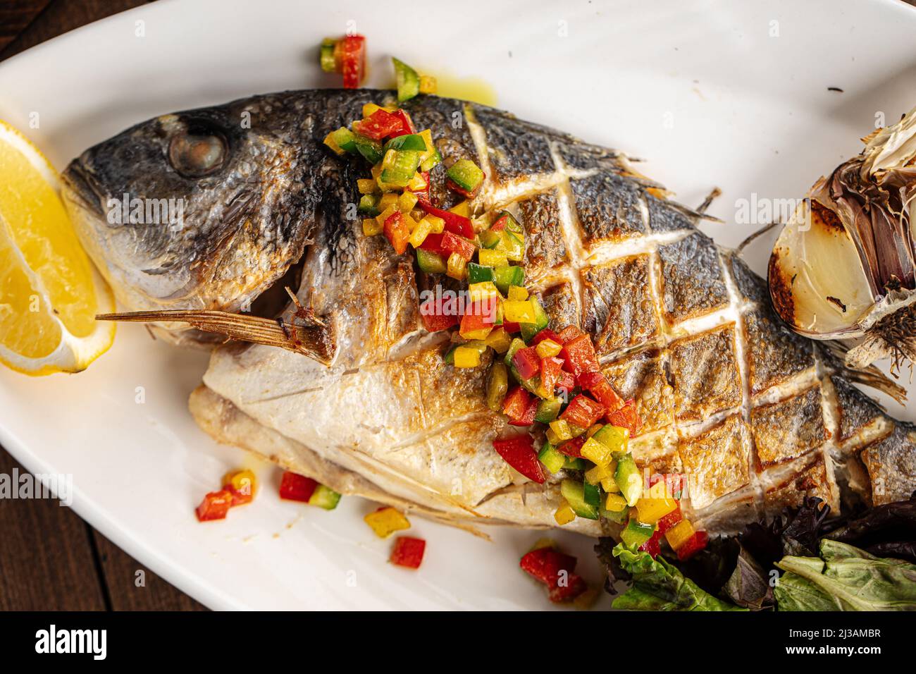 Seabass grilled with vegetables hi-res stock photography and images - Alamy