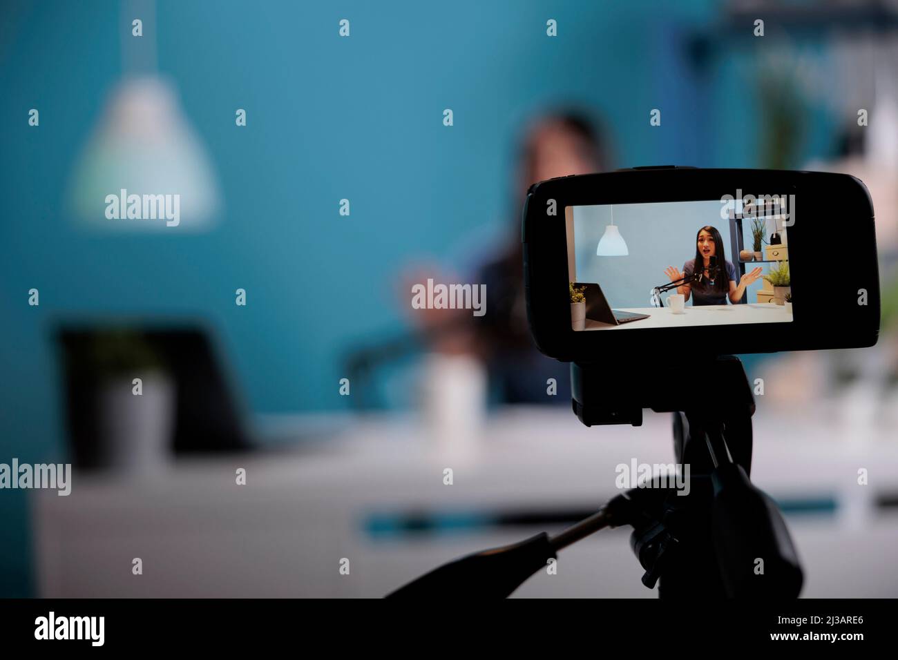 Asian influencer recording videoblog using production equipment in ...
