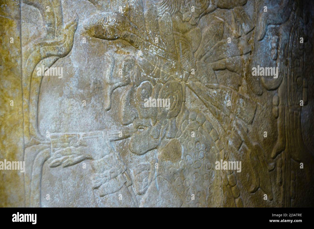 God of the underworld smoking a pipe, stone relief, Temple of the Cross ...