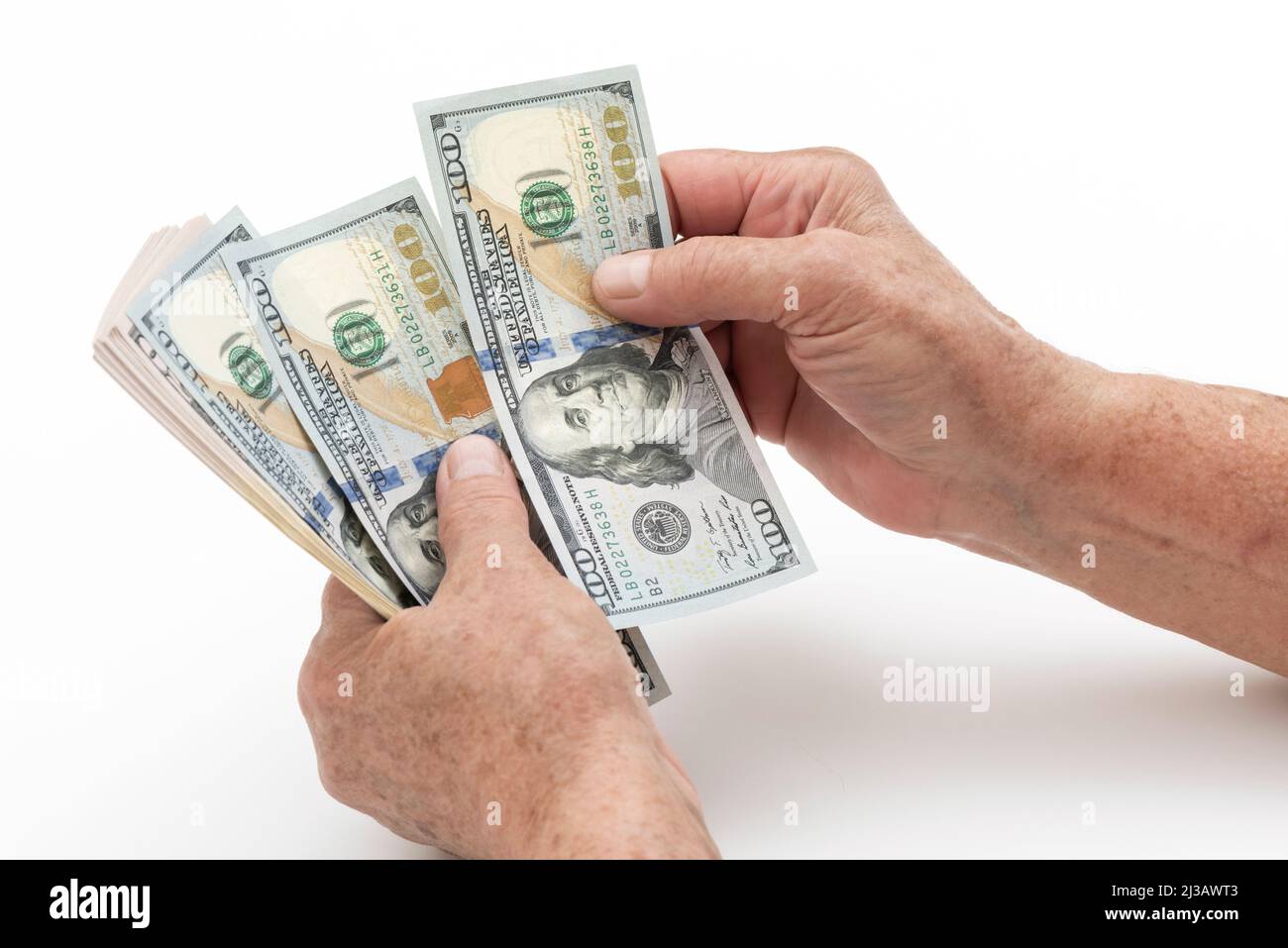 Hands counting US Hundred dollar bills Stock Photo - Alamy