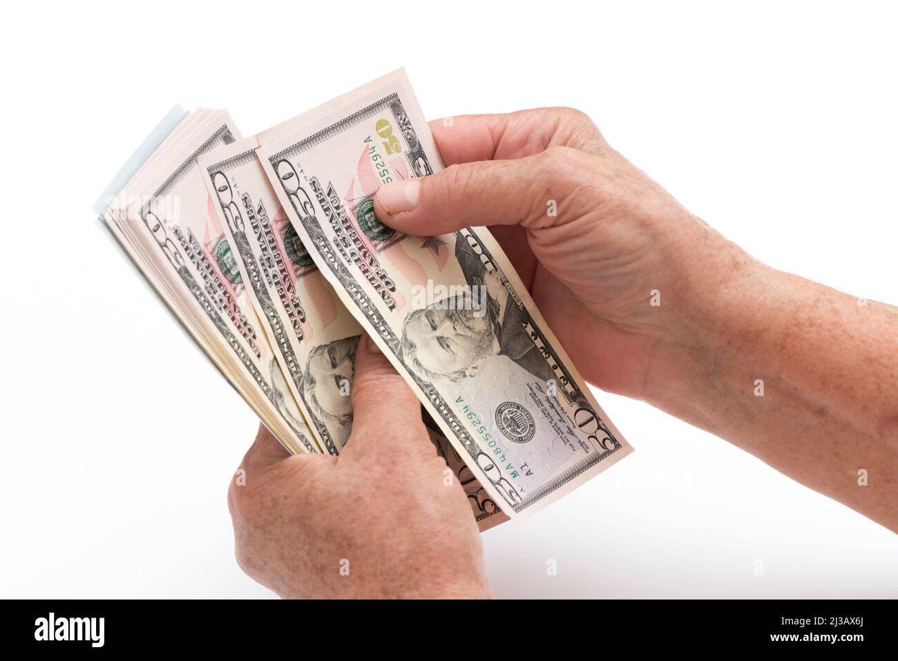 Hands counting us dollar bills hi-res stock photography and images - Alamy