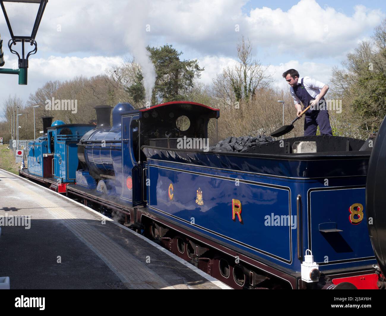 The fireman shovels coal forward on Caledonian Railway Class 812 0-6-0 ...