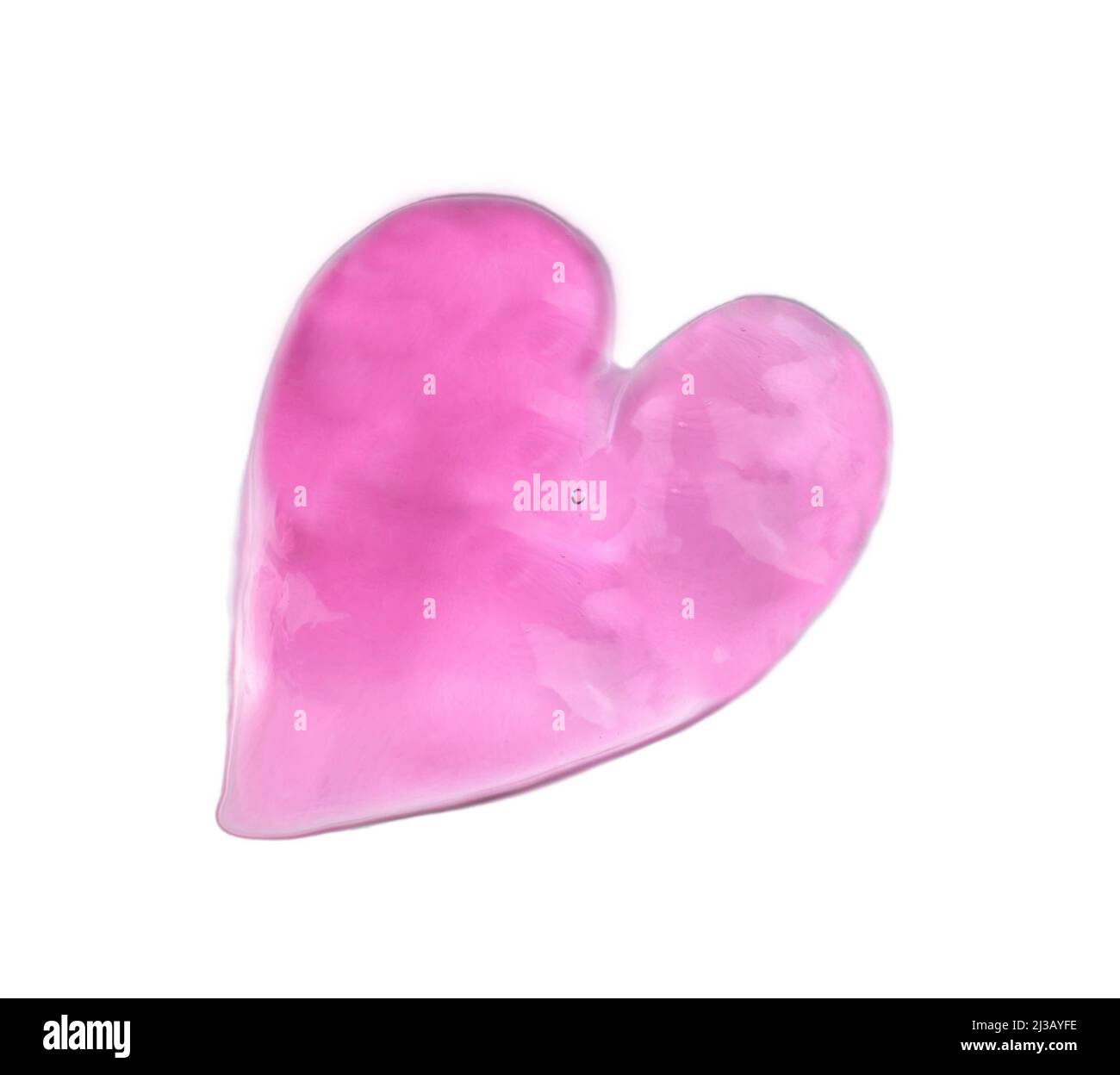 Structure of a pink gel in the shape of a heart on a white background ...