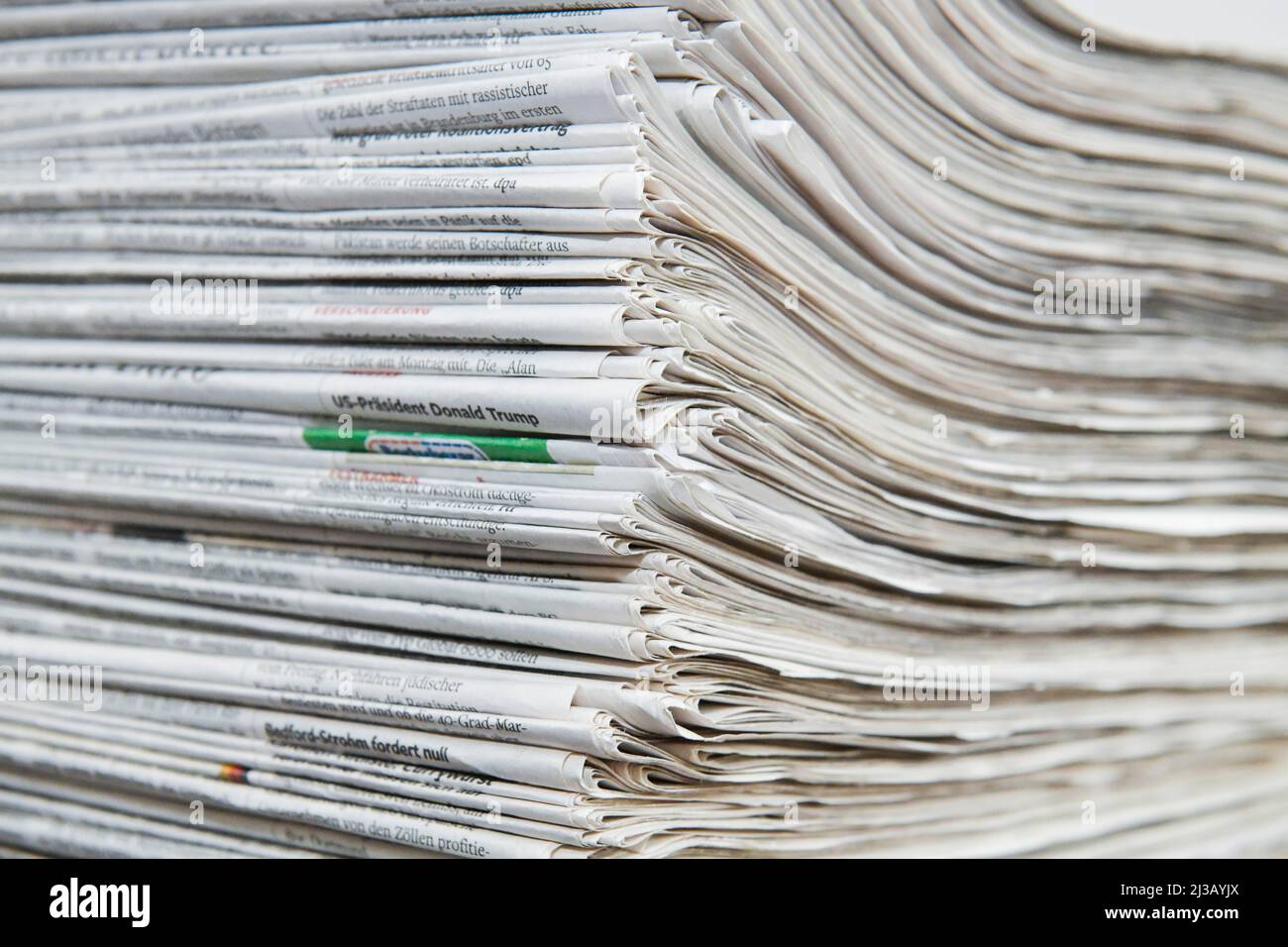 Stack of newspapers Stock Photo - Alamy