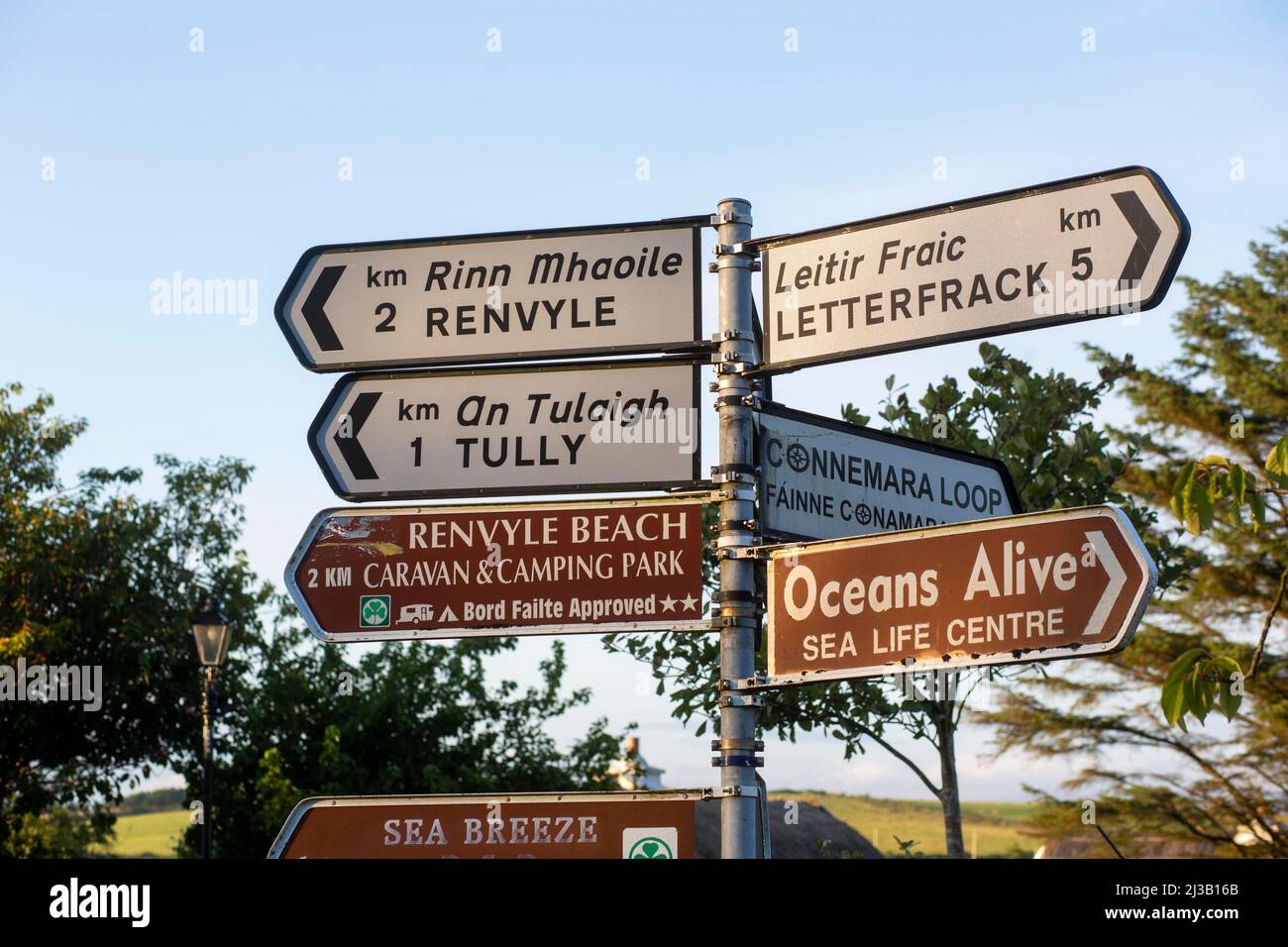 Signpost in Ireland in two languages, Irish and English, Ireland Stock ...
