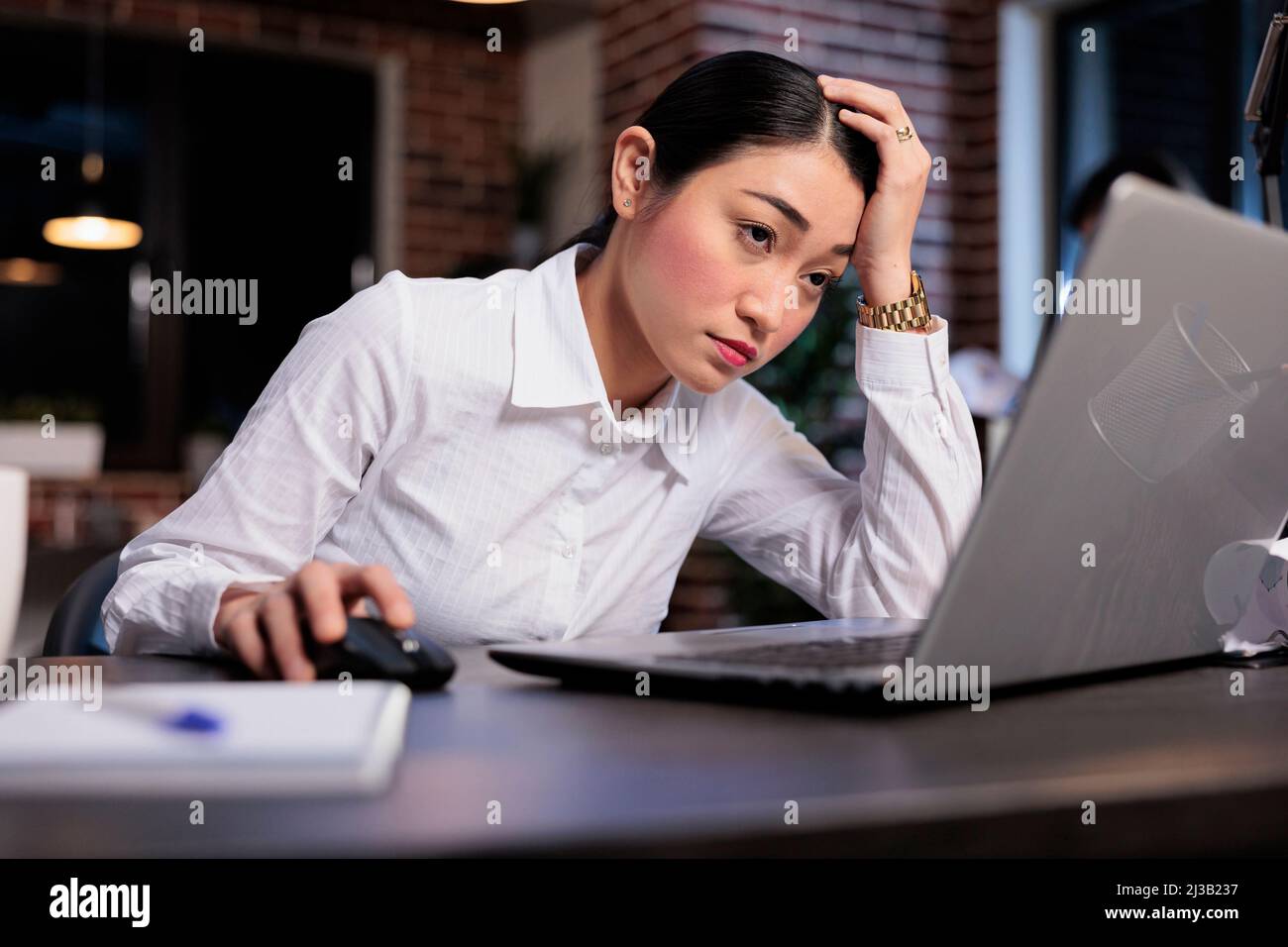 Exhausted company employee with migraine suffering from overtime work ...