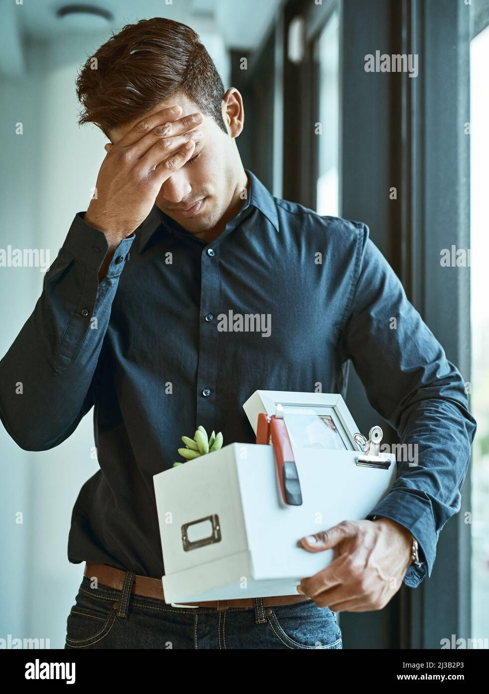 Stressed man getting fired from hi-res stock photography and images - Alamy