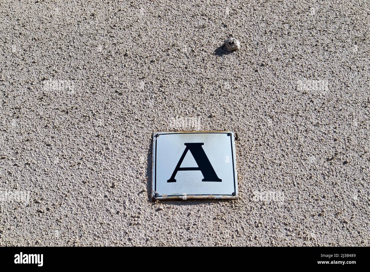 Letter A on the wall of a building Stock Photo - Alamy
