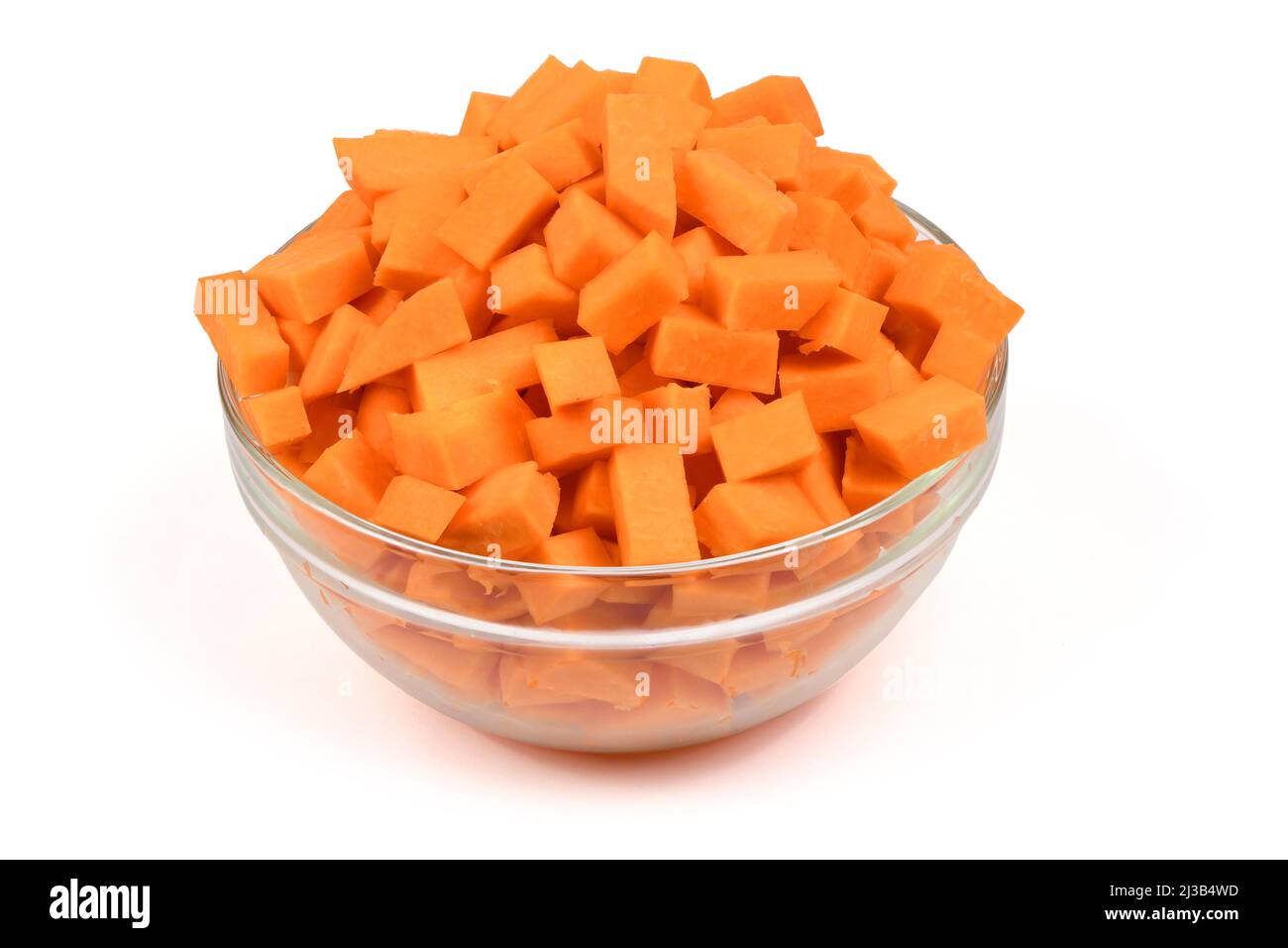 Ripe chopped Butternut squash (Cucurbita moschata). Vegetable in glass ...