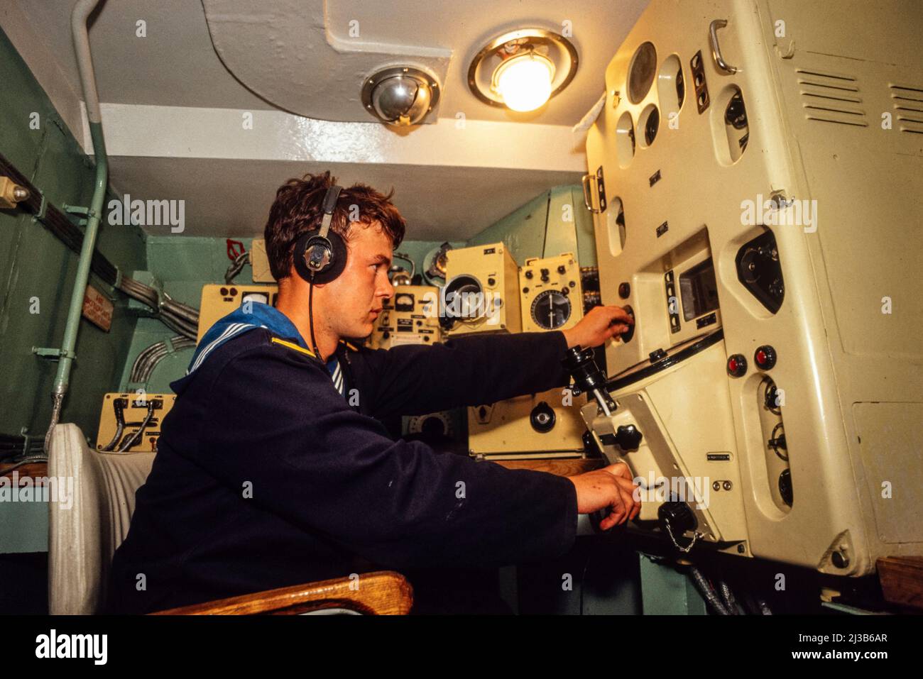 KGB naval officers in the control room onboard a border parol vessel on ...