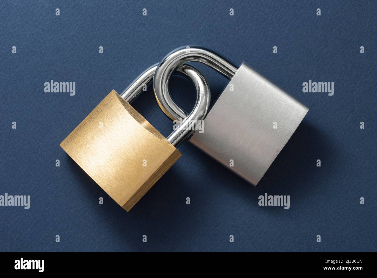 Locked Padlocks on the blue background Stock Photo - Alamy