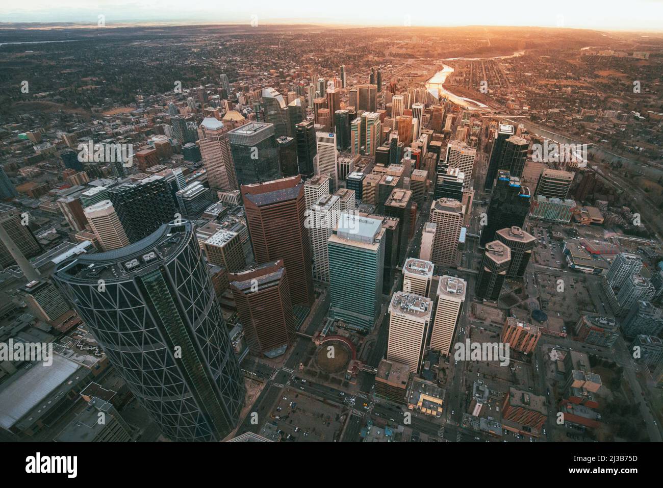 Aerial view of city with sunset on the horizon Stock Photo - Alamy