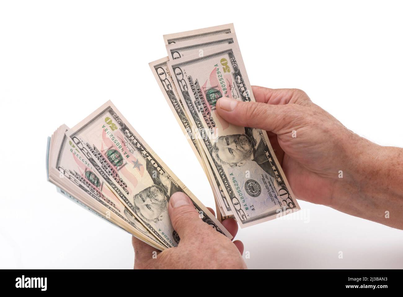 Hands counting us dollar bills hi-res stock photography and images - Alamy