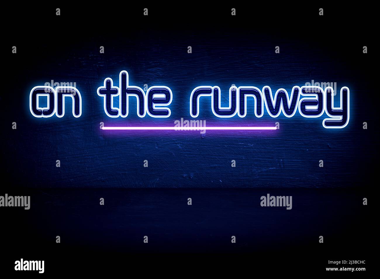 On the runway - blue neon announcement signboard Stock Photo - Alamy