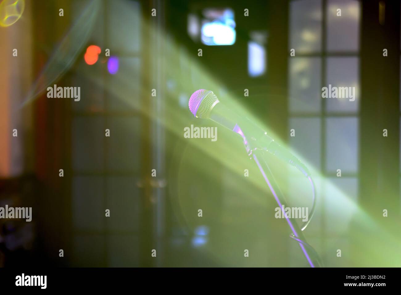 Stage microphone in the rays of light Stock Photo - Alamy