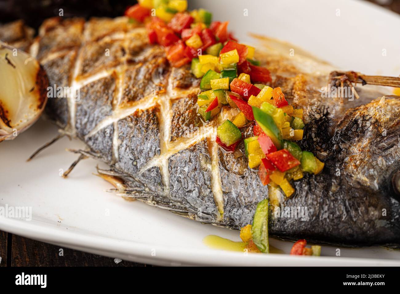 Seabass grilled with vegetables hi-res stock photography and images - Alamy