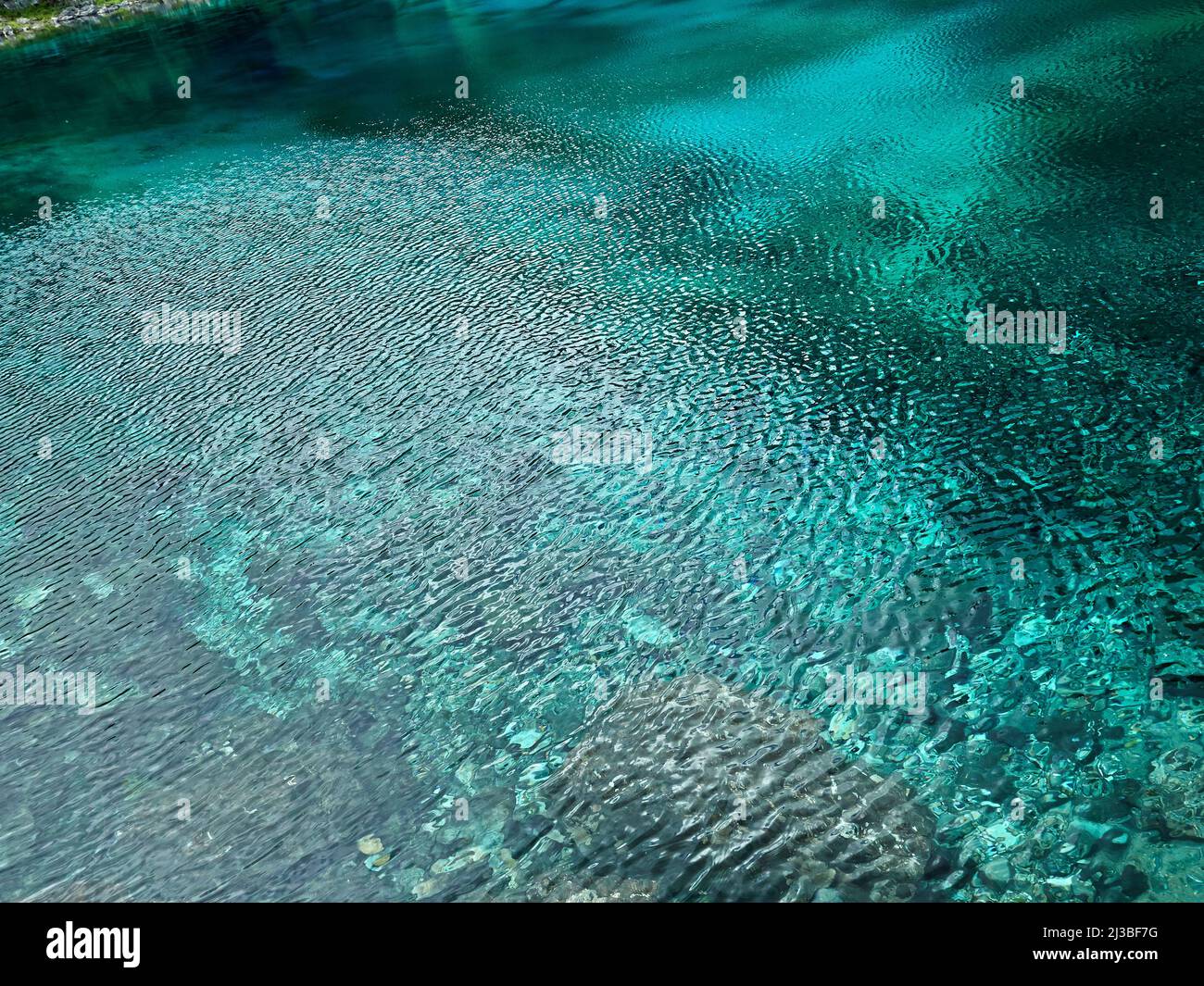 The ripple effect in the blue sea waves Stock Photo - Alamy