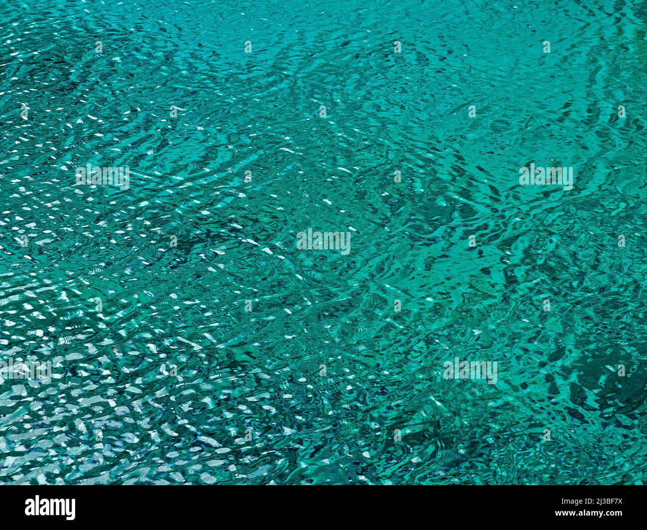 The ripple effect in the blue sea waves Stock Photo - Alamy