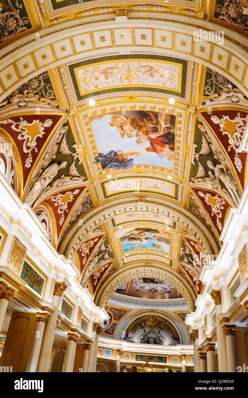 A vertical shot of the interior decorations of the top of Sistine ...