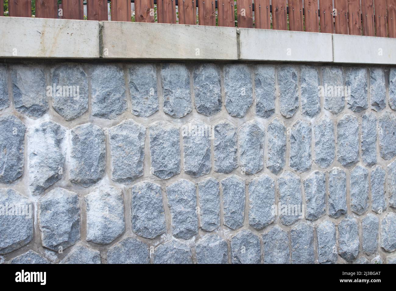 Modern flood protection wall in the style of the historic city wall ...