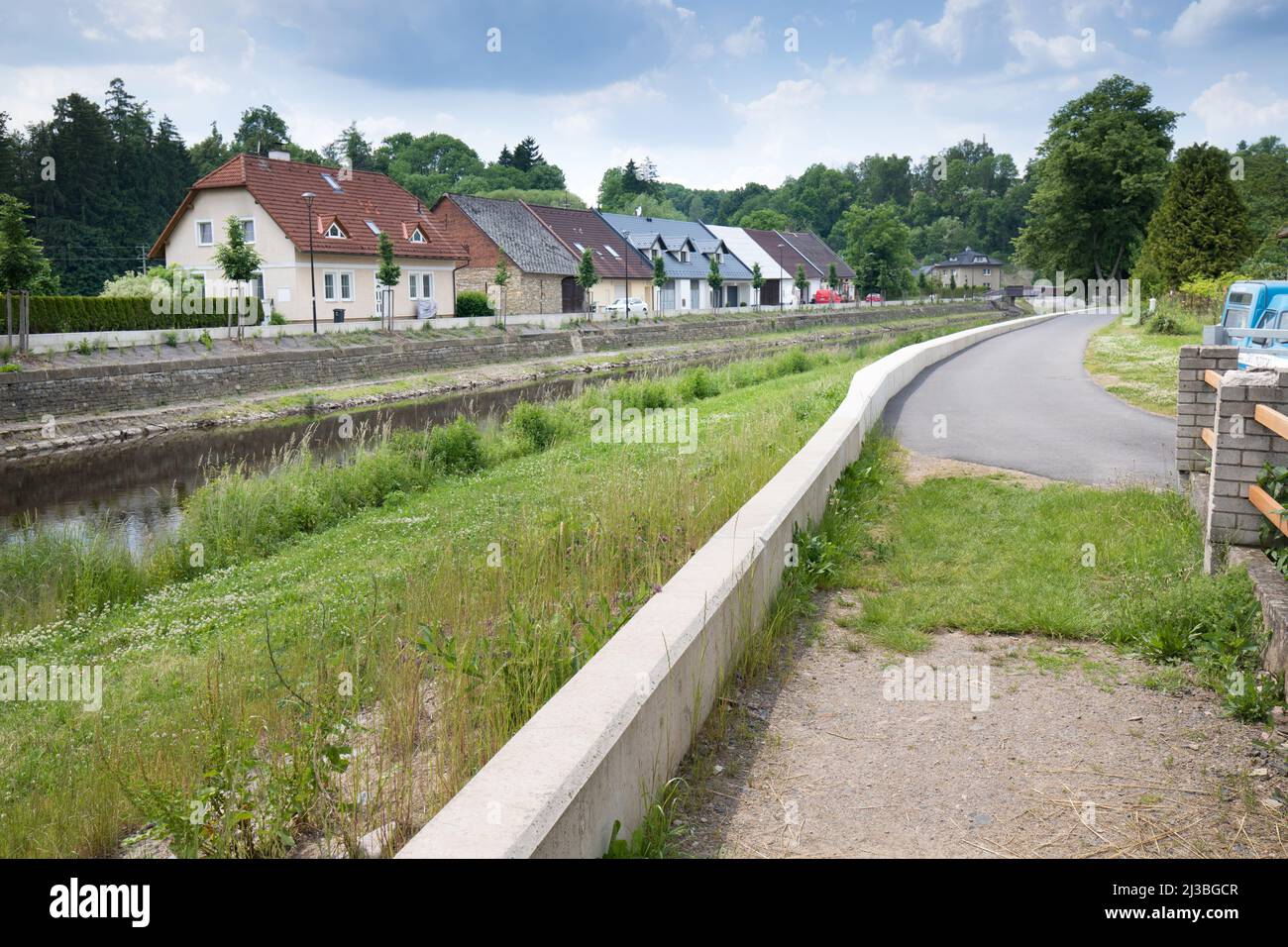 Modern flood protection wall in the style of the historic city wall ...