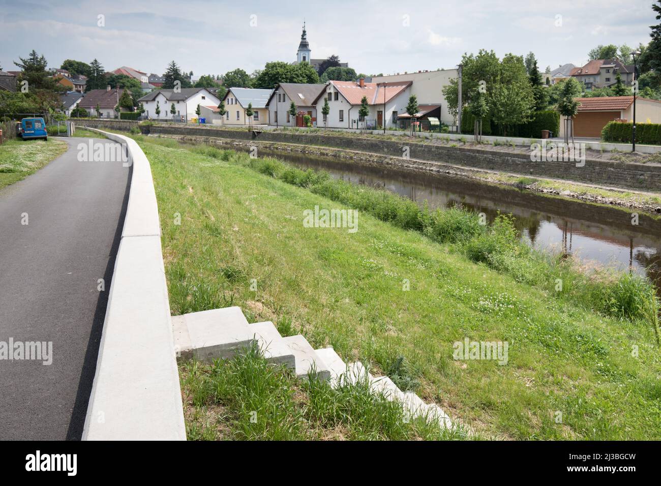 Modern flood protection wall in the style of the historic city wall ...