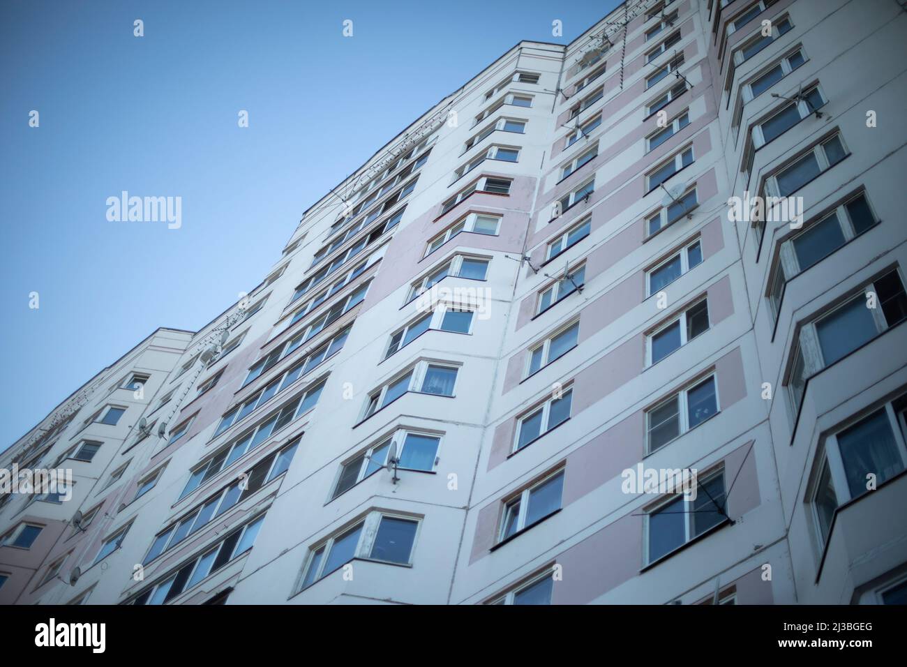 Residential building in city. Urban architecture. Lots of windows in ...