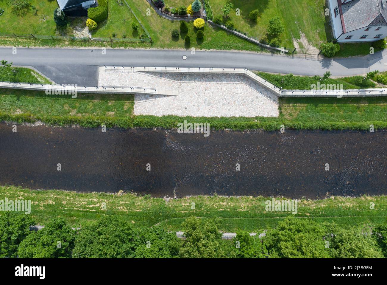 Modern flood protection wall in the style of the historic city wall ...