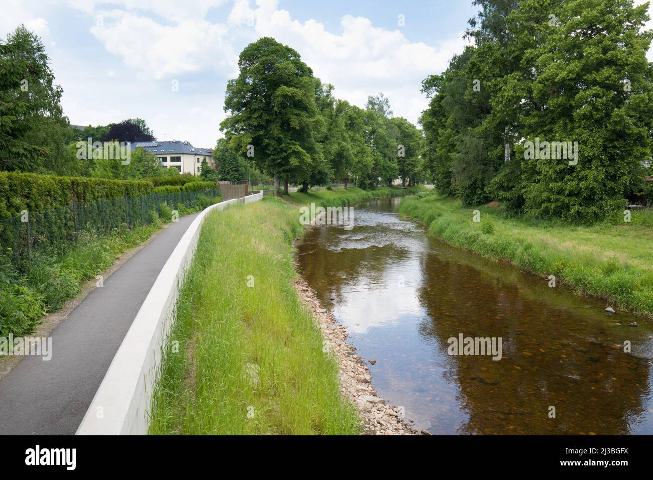 Modern flood protection wall in the style of the historic city wall ...
