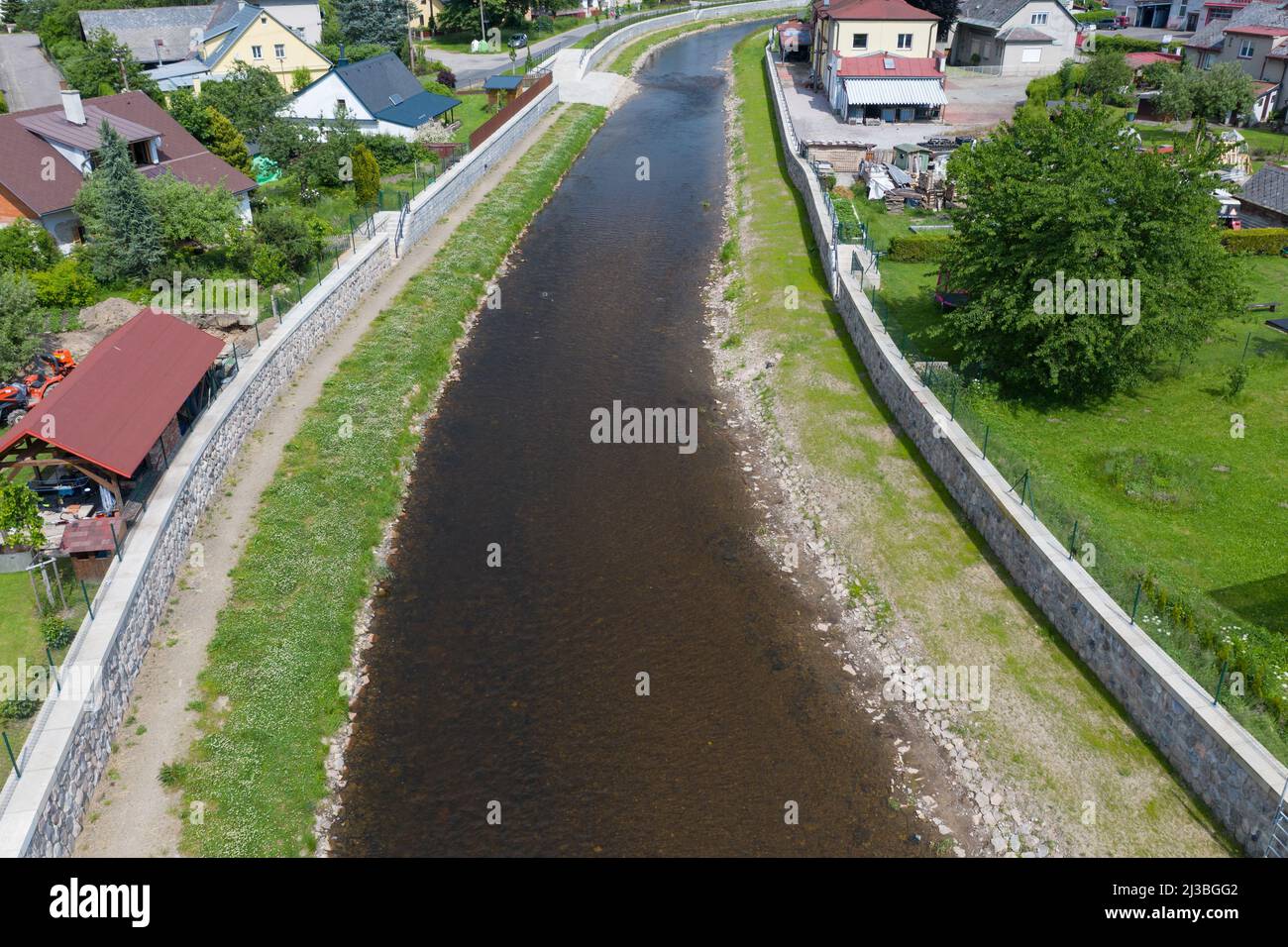 Modern flood protection wall in the style of the historic city wall ...
