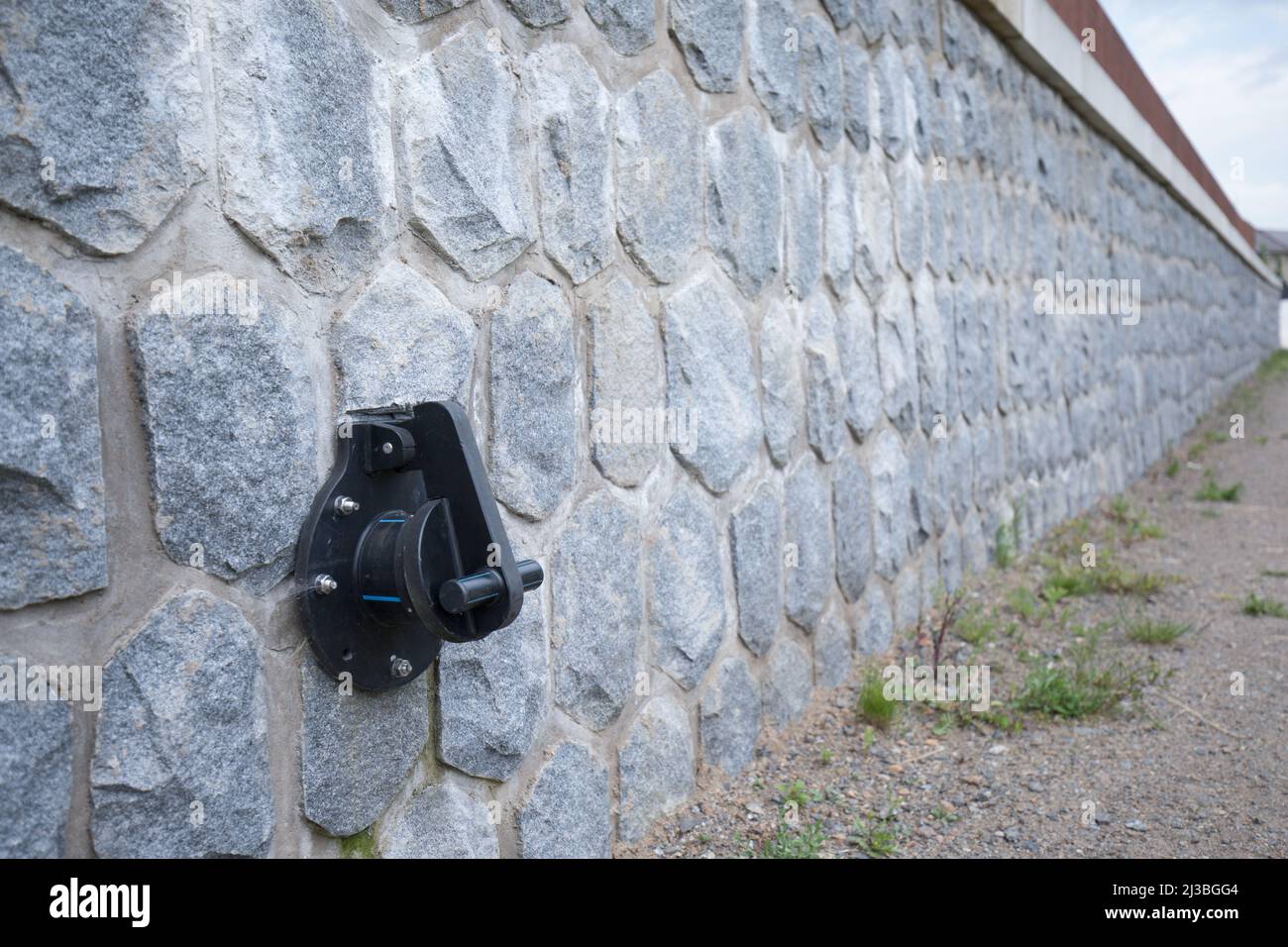 Modern flood protection wall in the style of the historic city wall ...
