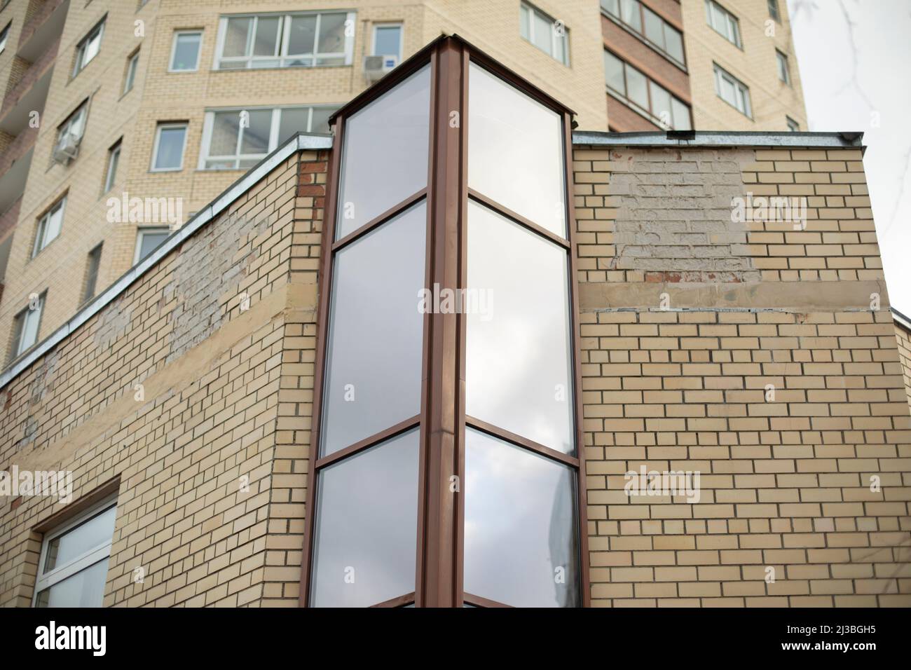 Glazing of building. Architecture details. Glass on corner of house ...