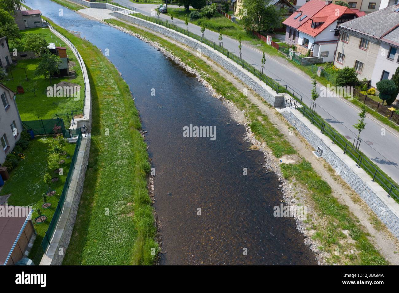 Modern flood protection wall in the style of the historic city wall ...