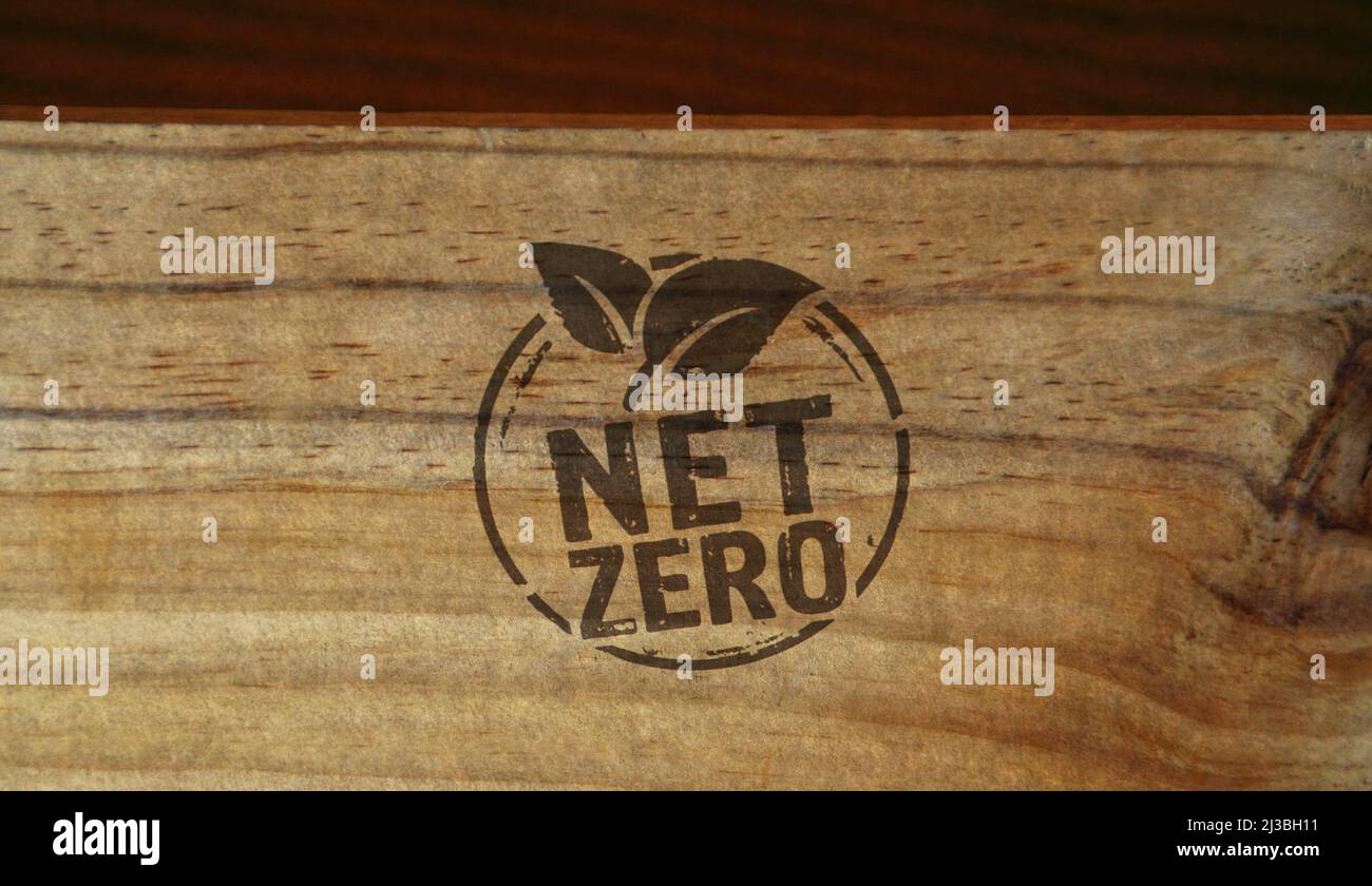 Net zero and eco friendly symbol stamp printed on wooden box. Co2 ...