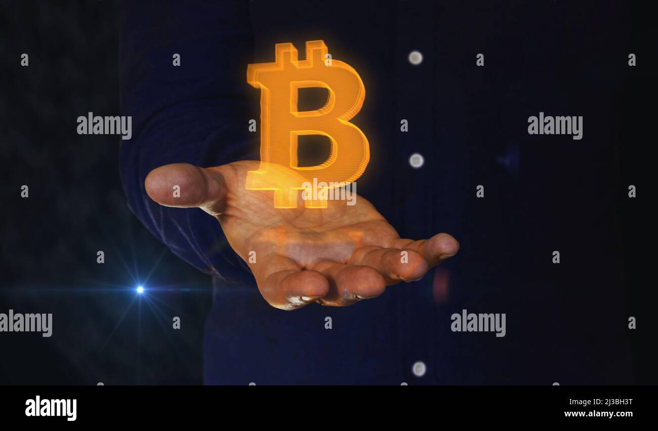 Bitcoin blockchain crypto currency and digital money 3d symbol over man hand. Cyber technology ...