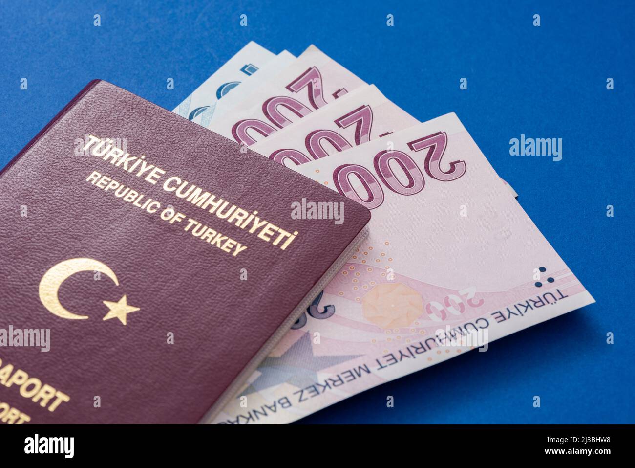 Turkish citizen public passport and Turkish Lira banknotes Stock Photo ...