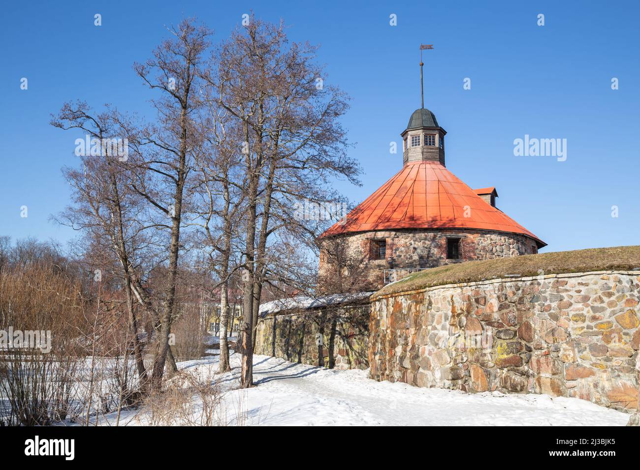 Ancient medieval fortress Korela. Round tower and fortress wall ...