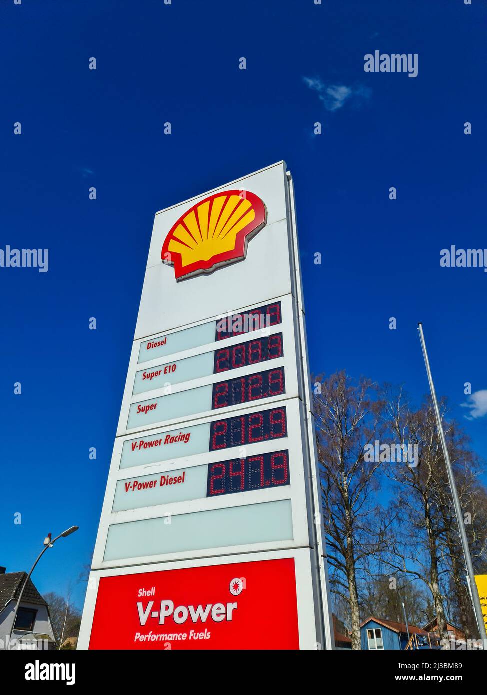A vertical shot of the display of very high gasoline prices of a Shell ...