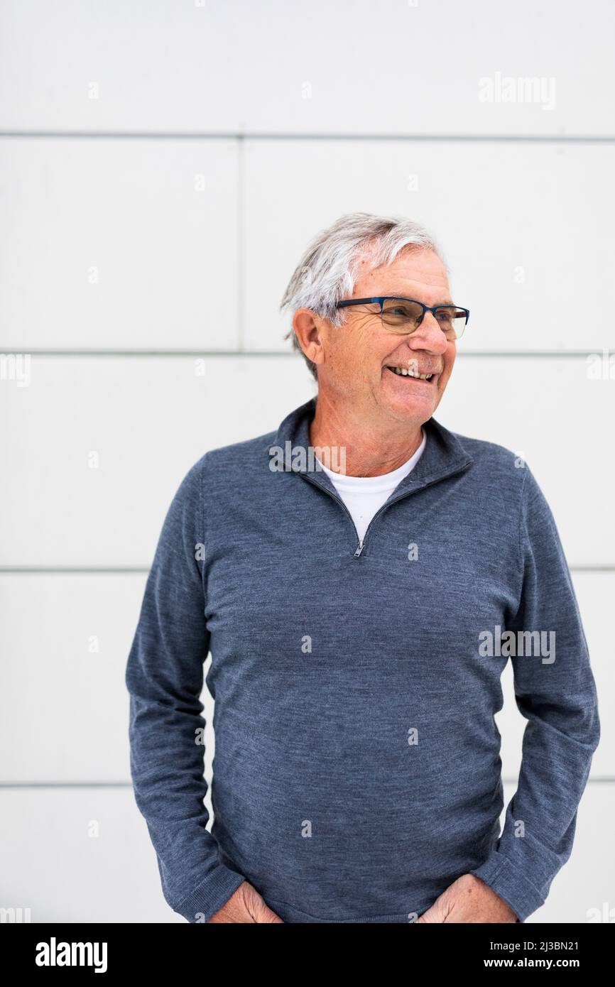Man in grey sweater hi-res stock photography and images - Alamy
