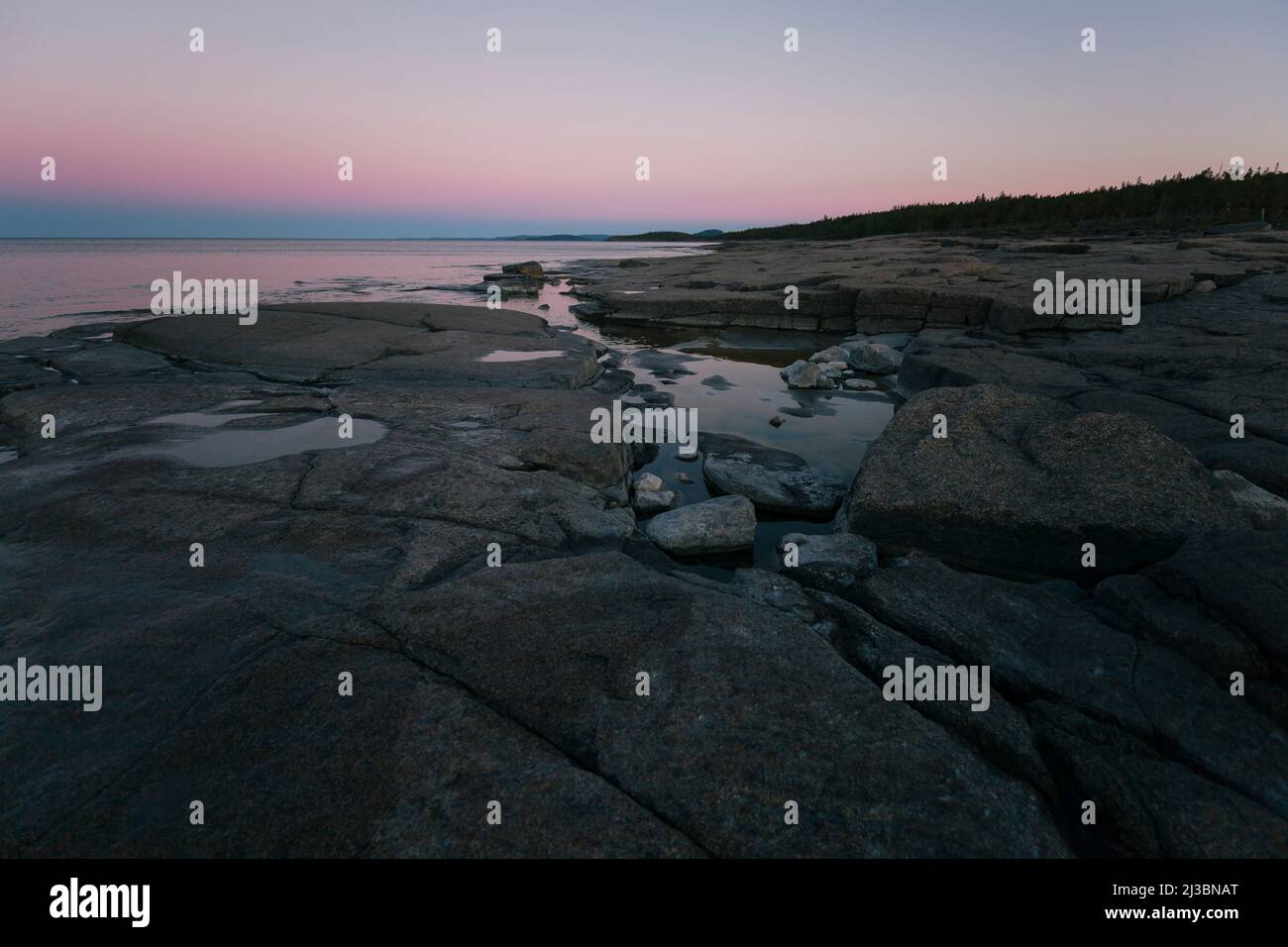 Atmospheric sunset over rocky hi-res stock photography and images - Alamy