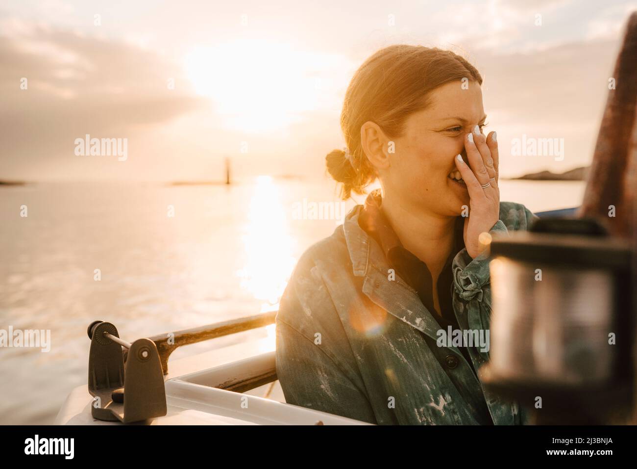 Woman laughing sea hi-res stock photography and images - Alamy
