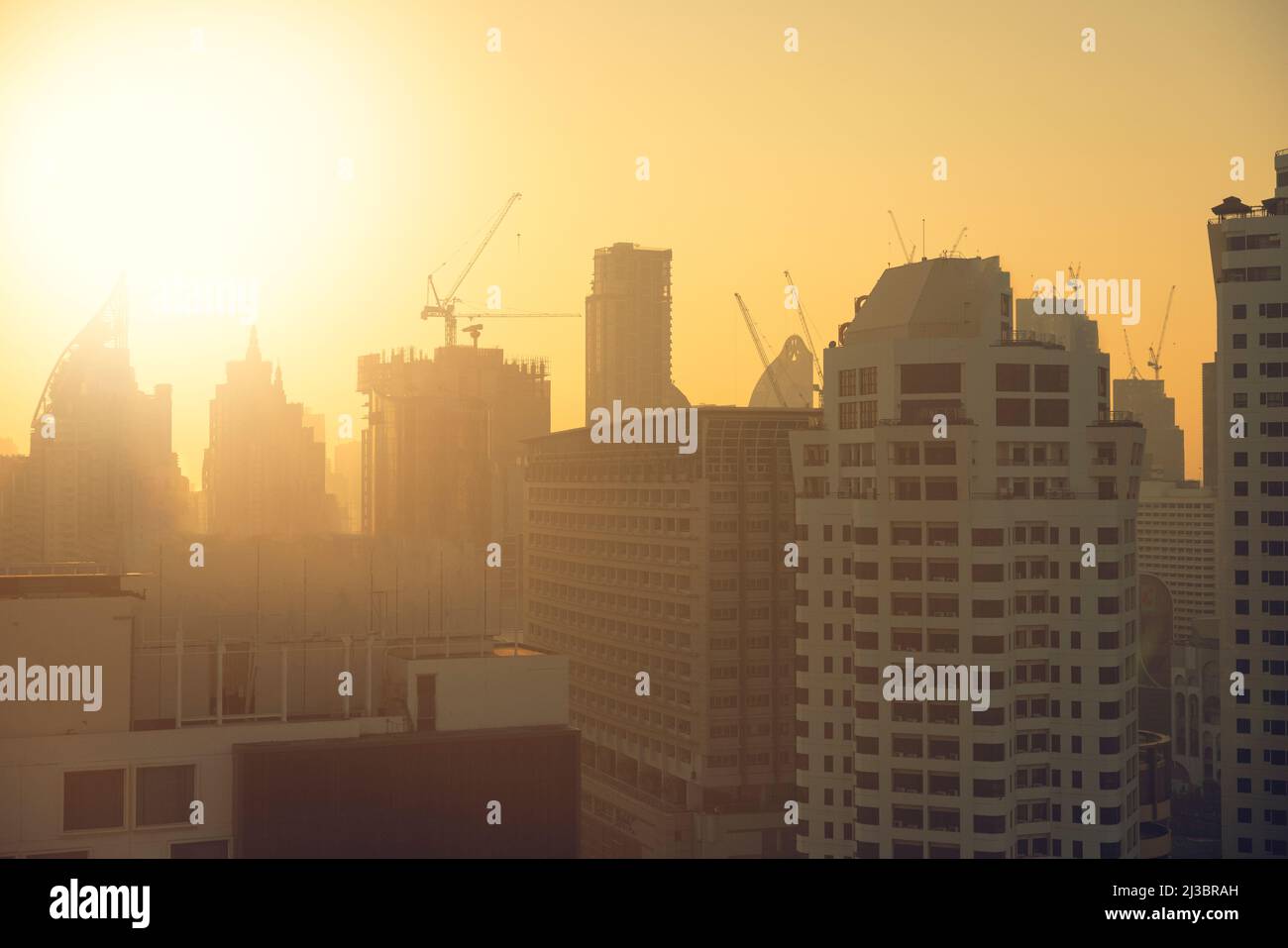 Cityscape with skyscrapers at sunrise Stock Photo - Alamy