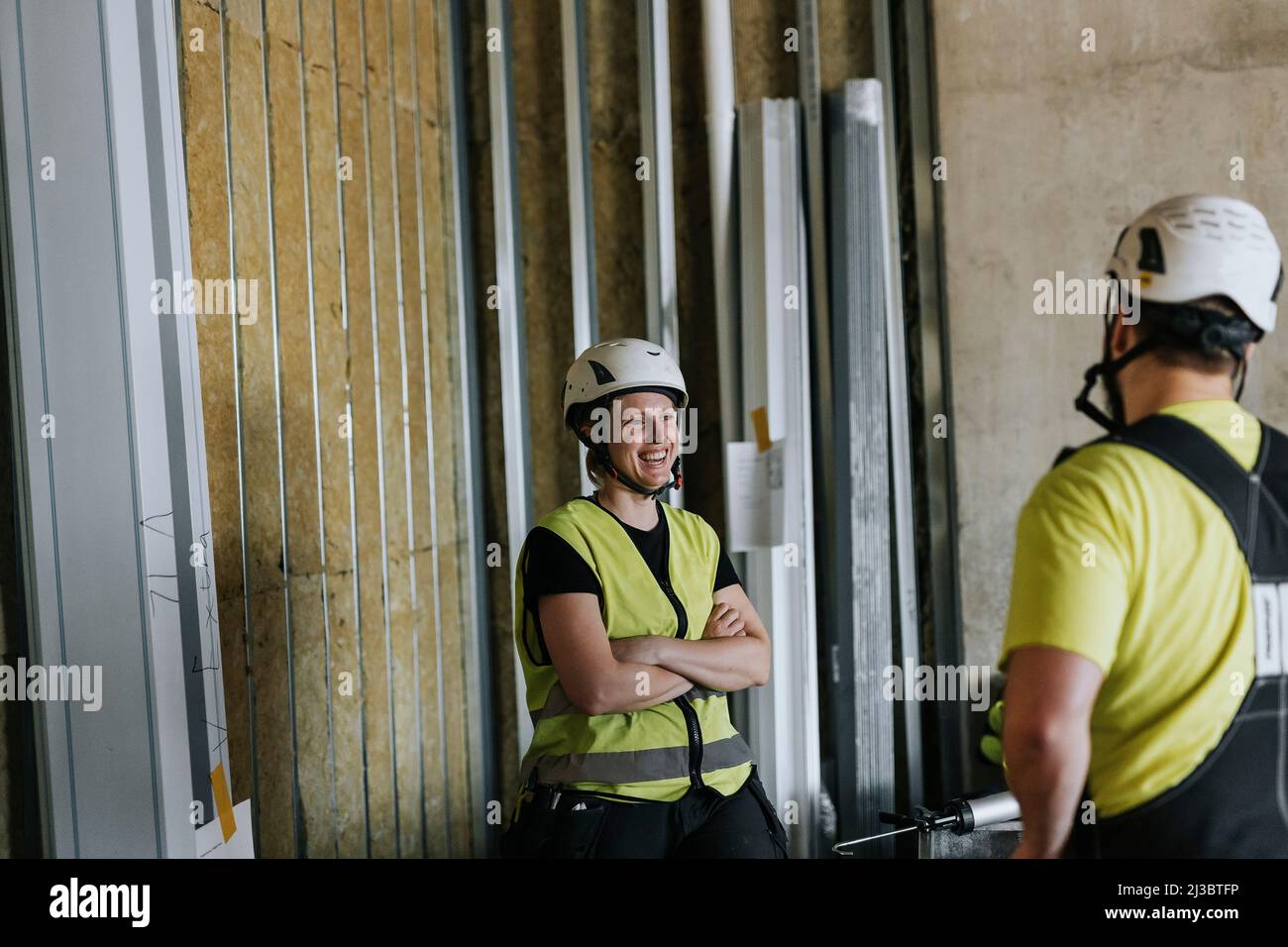People talking at construction site Stock Photo - Alamy