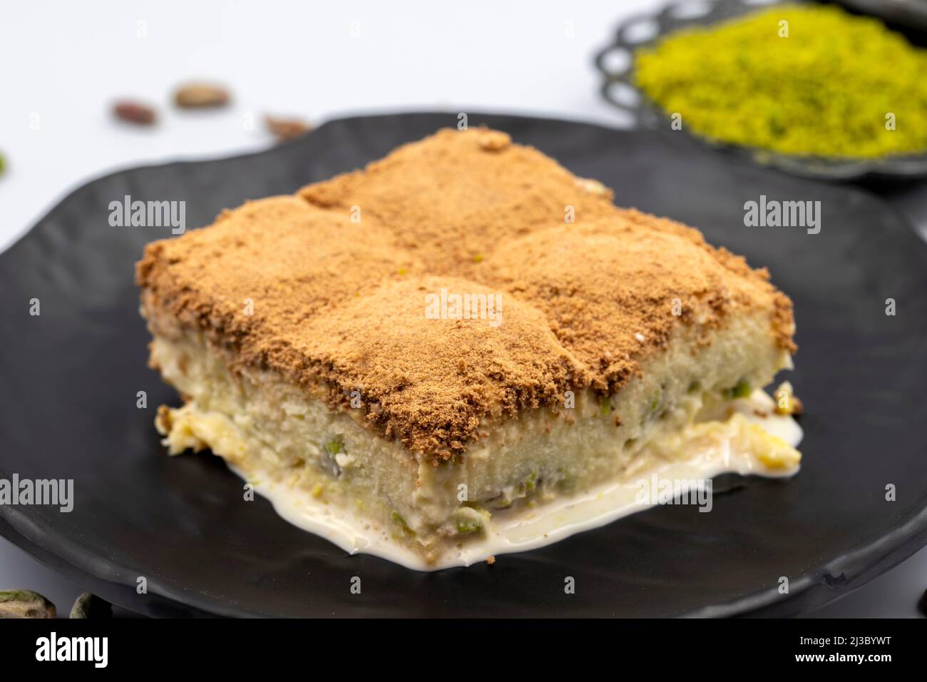 Cold baklava on a white background. Cold baklava prepared with milk and ...