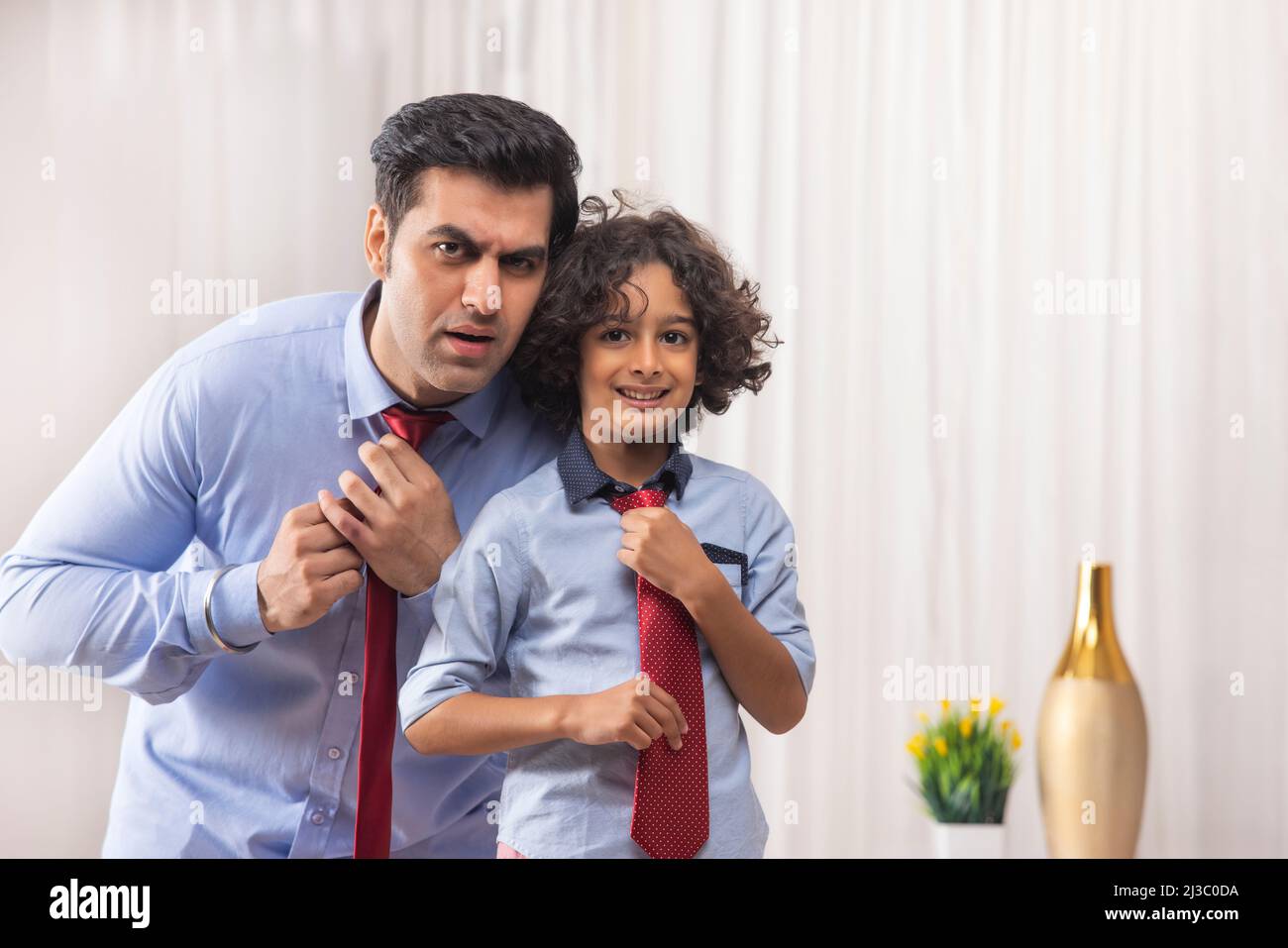 Wearing ties hi-res stock photography and images - Alamy