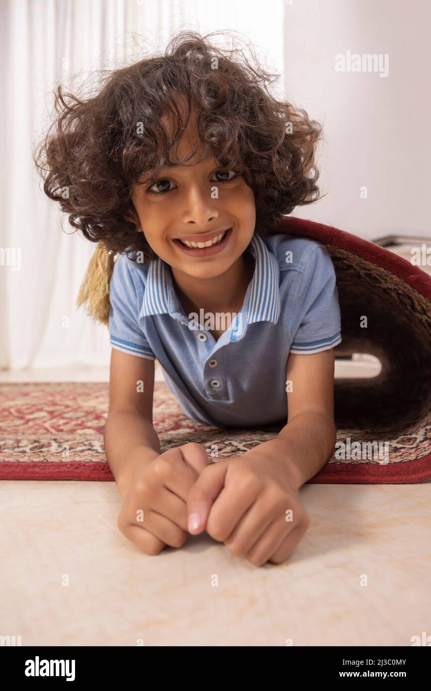 Boy lying down hi-res stock photography and images - Alamy