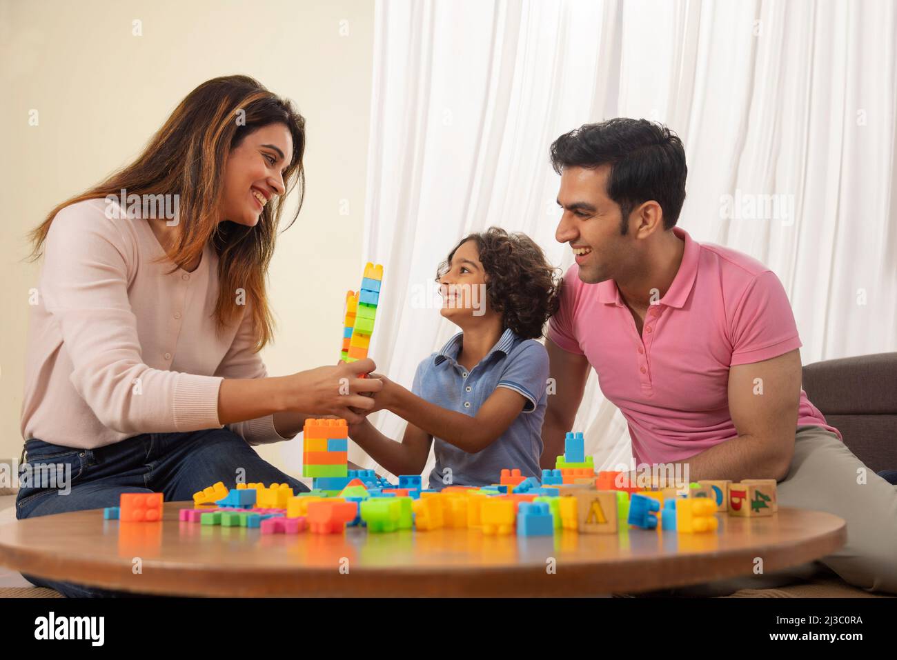 Father son playing blocks hi-res stock photography and images - Alamy