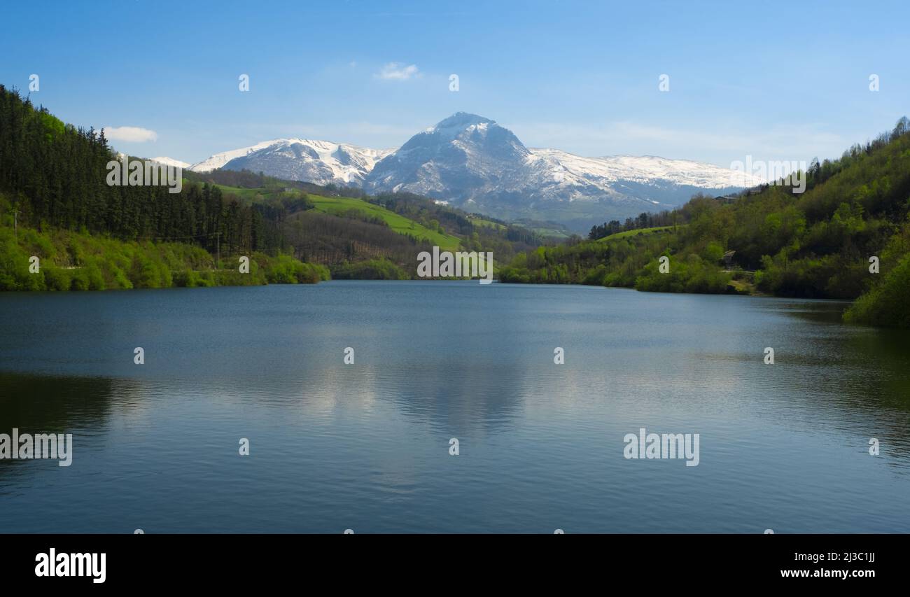 Ibiur reservoir and Mount Txindoki in the Sierra de Aralar Natural Park ...