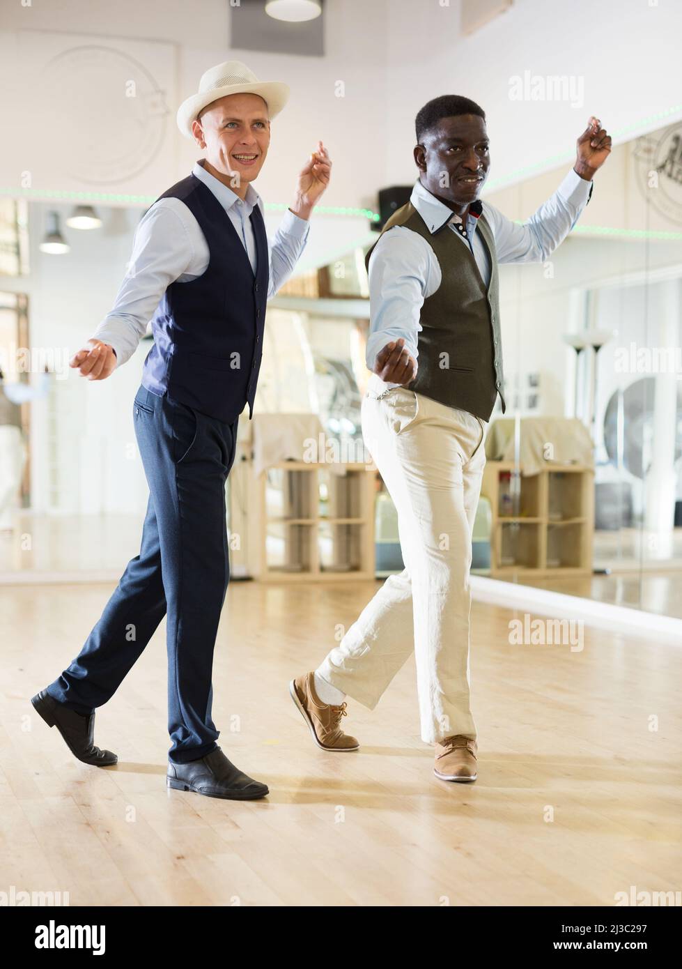 Two men dancing together ballroom hi-res stock photography and images ...