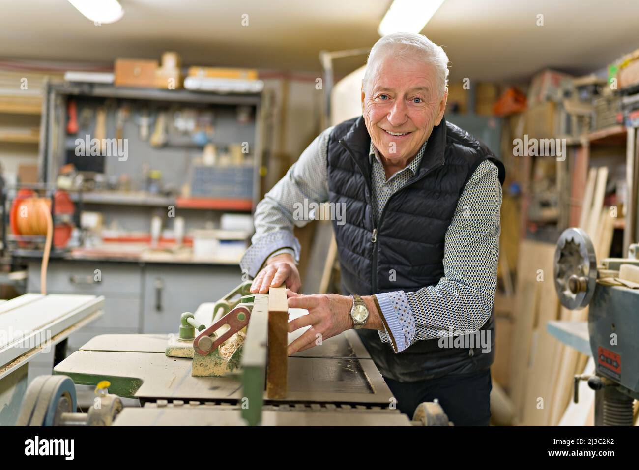 senior grandpa in the home workshop working Stock Photo - Alamy